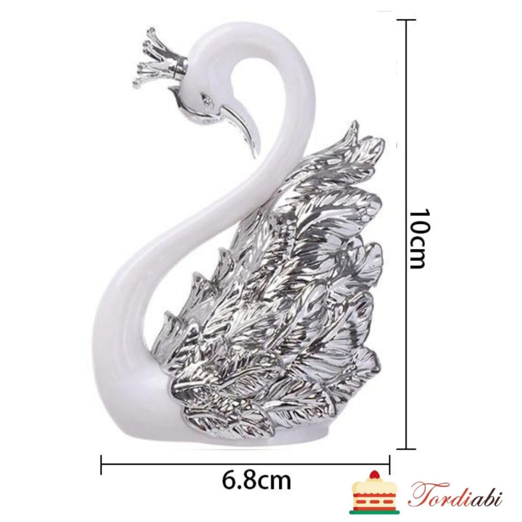 Valged luiged/ luigepaar hõbedaste tiibadega/ mittesöödavad pulmatordi ...