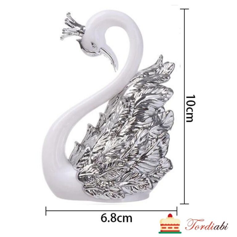 Valged luiged/ luigepaar hõbedaste tiibadega/ mittesöödavad pulmatordi ...